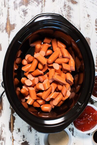 Slow Cooker Bourbon Hot Dogs - The Magical Slow Cooker